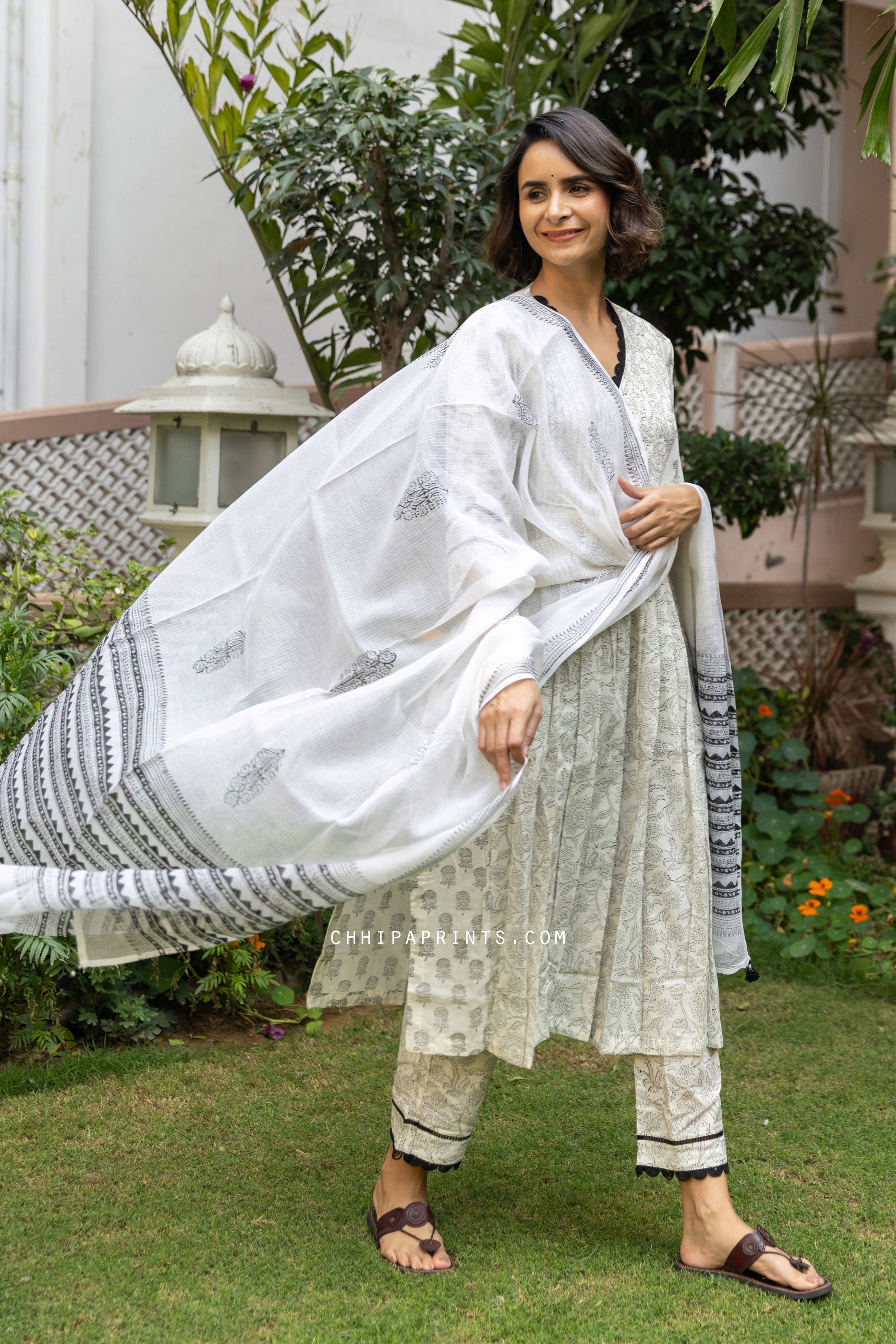 Cotton Block Print V Neck Shell Tuck Kurta Set in Shades of Black & Iv ...